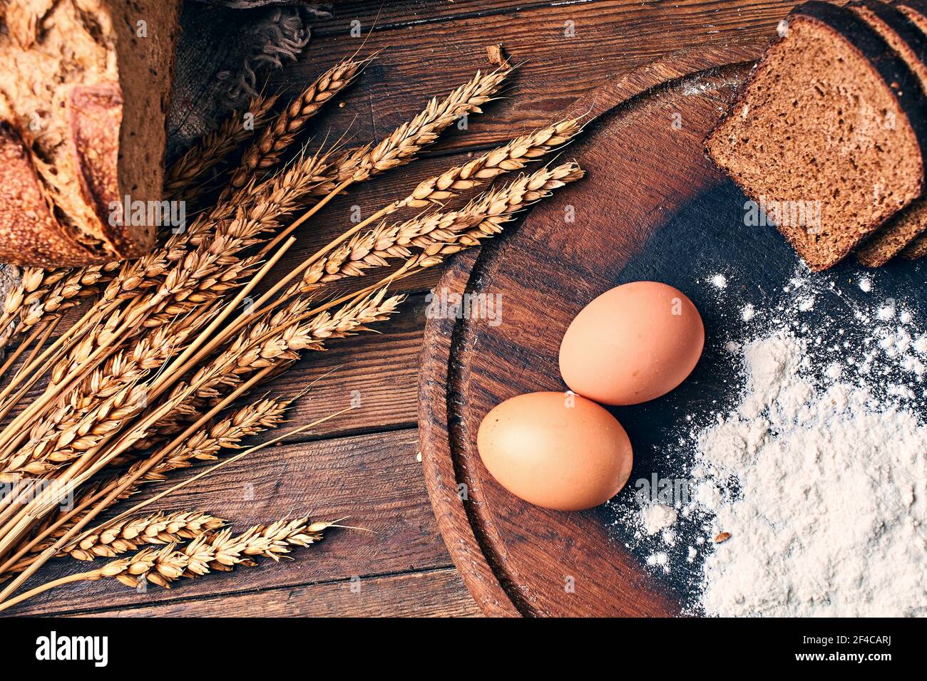 Still life with bread and its ingredients in vintage setting Stock ...