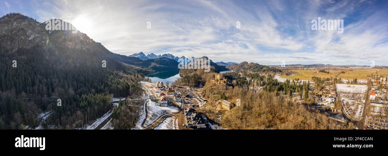 Aerial panorama drone shot of Hohenschwangau by lake in Fussen with ...