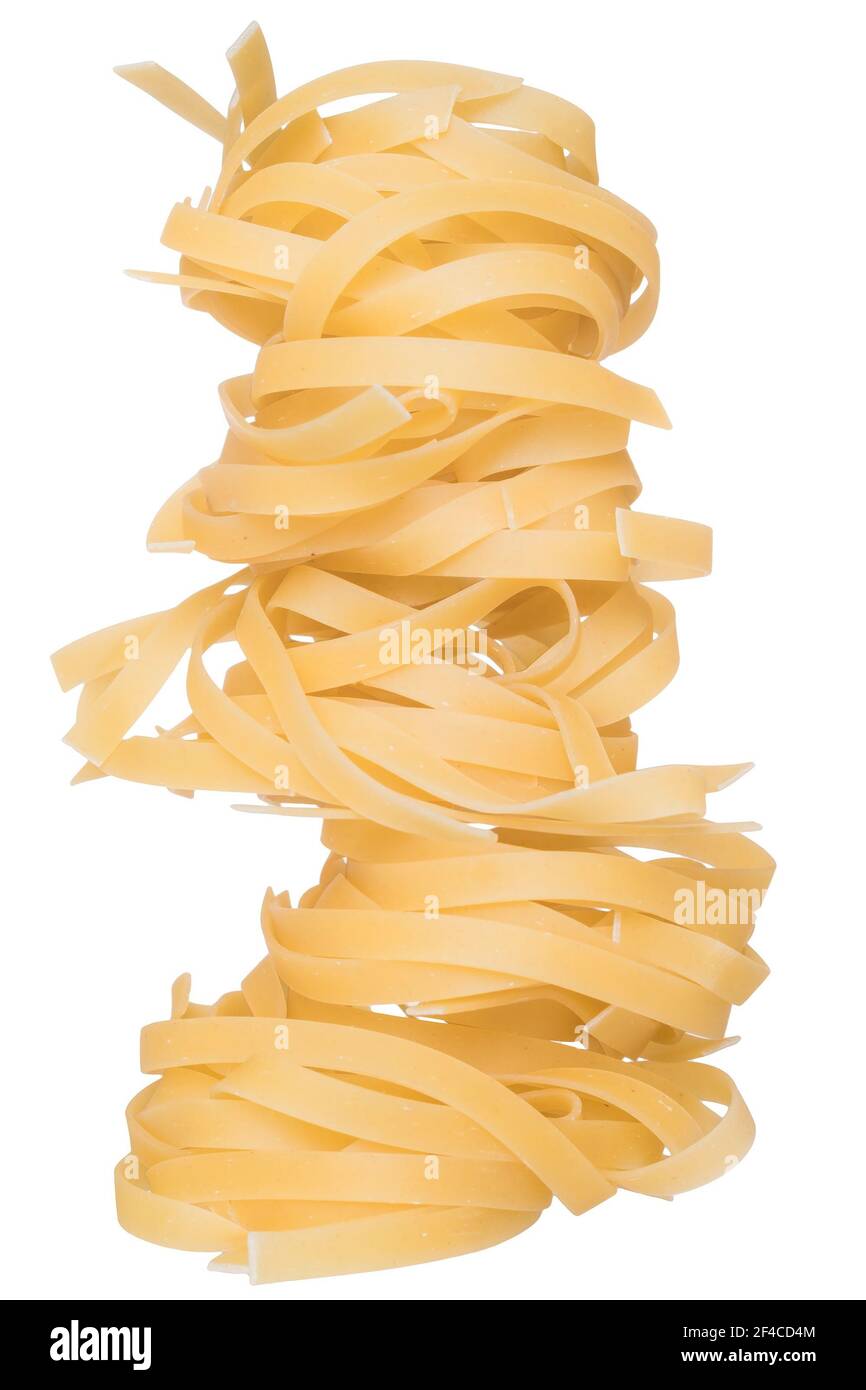 Pasta nest tower close up on a isolated white background Stock Photo ...