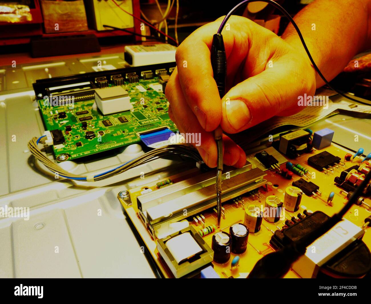 TV and electronics repair. removed back panel & exposed circuit board ...