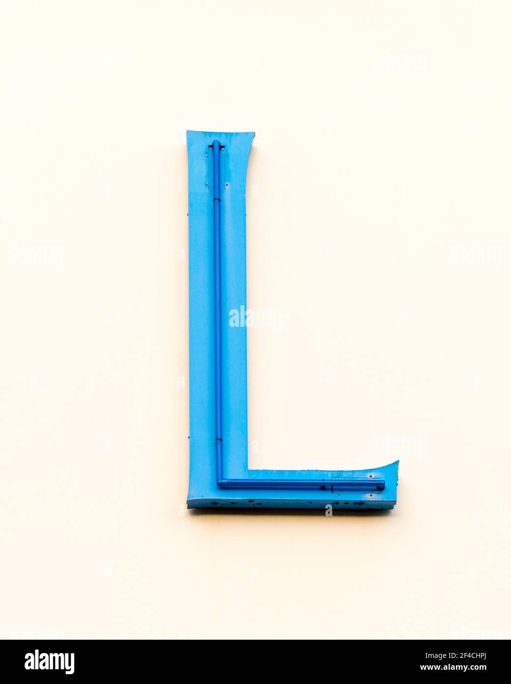 Blue letter E with serifs and deep blue neon tubes Stock Photo - Alamy