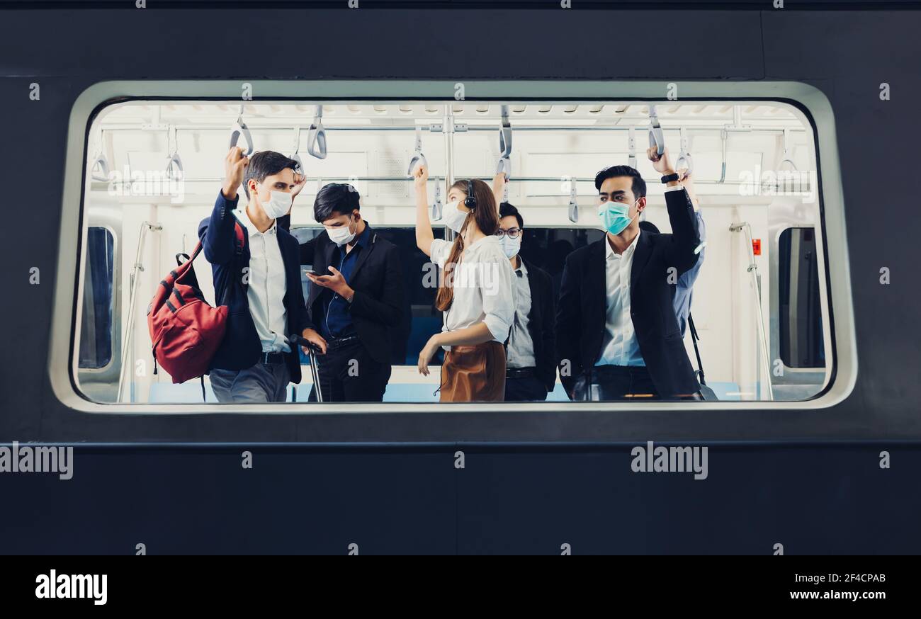 People on the train wear anti-virus masks and travel during rush hours ...