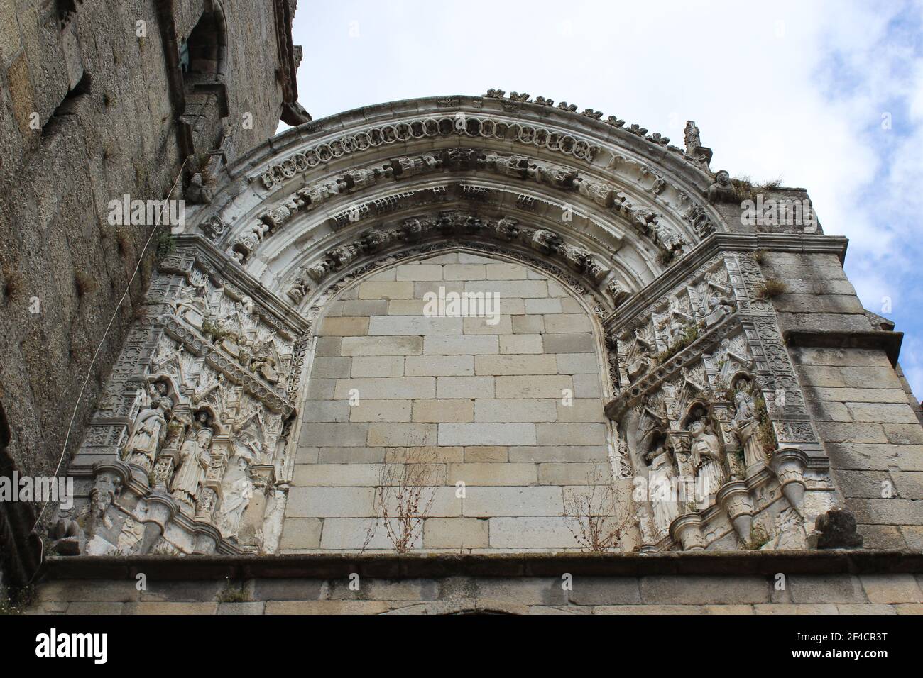 facde of catholic monument with gothic art in stone Stock Photo - Alamy
