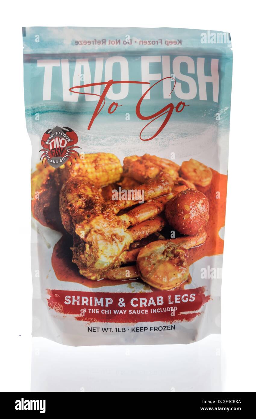 Winneconne, WI - 19 March 2021: A package Two fish to crab legs and ...