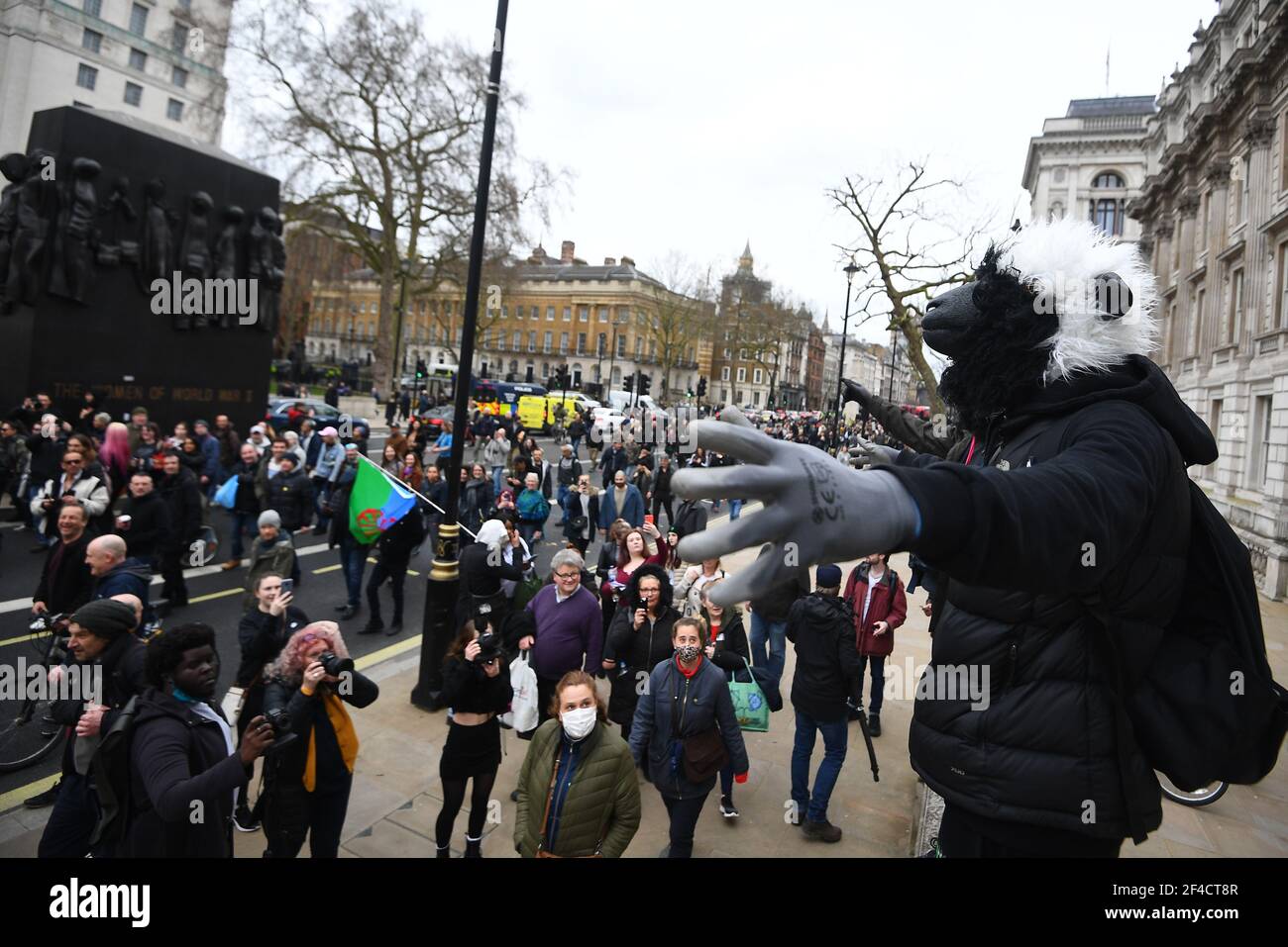 People taking part in an anti-lockdown protest in central London ...