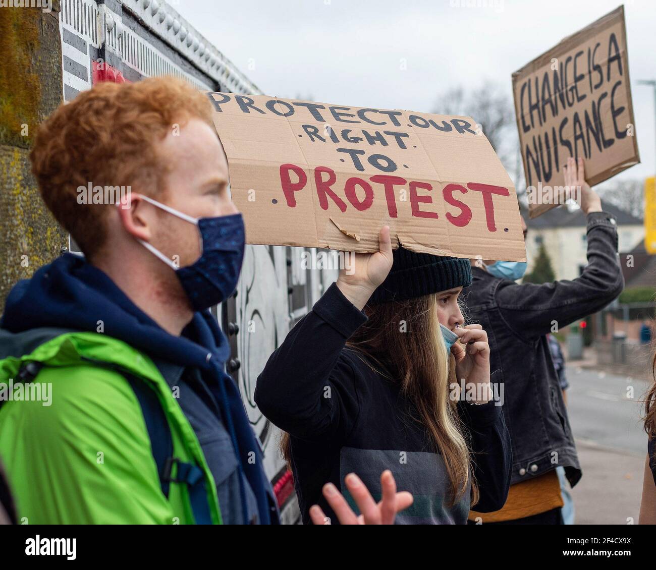 A crowd of peaceful protestors march through Cheltenham High Street ...