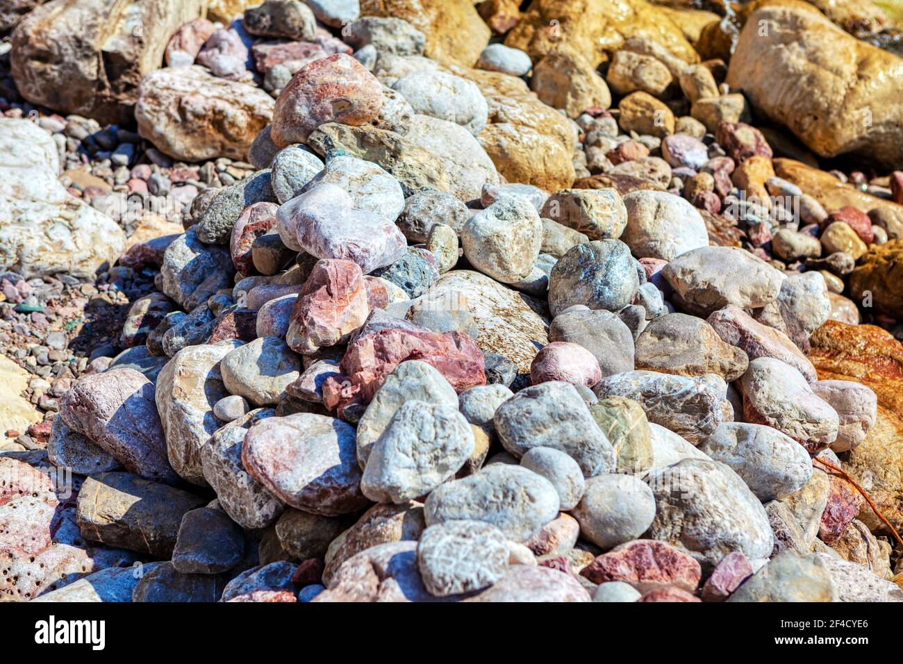 coastal pebbles , beach rough surface , hot stones on the shore Stock ...