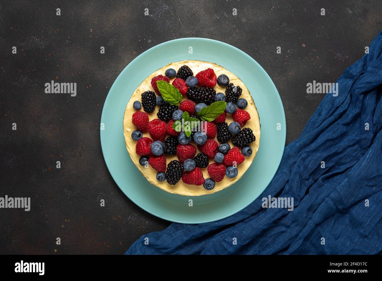 Homemade cake with fresh berries on dark background Stock Photo - Alamy
