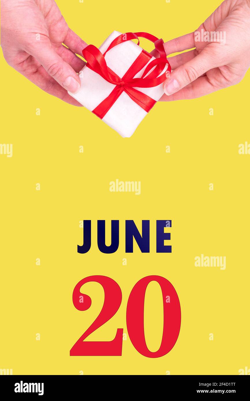 June 20th. Festive Vertical Calendar With Hands Holding White Gift Box ...