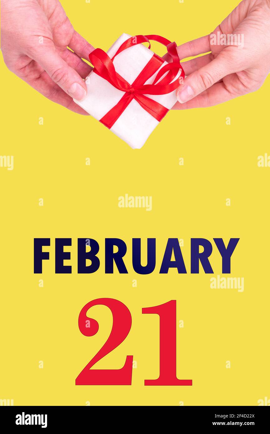 February 21st. Festive Vertical Calendar With Hands Holding White Gift ...