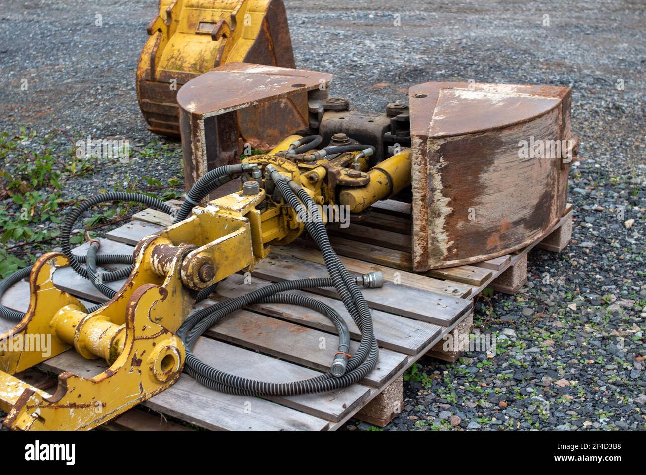 A rusty ditch digging machine Stock Photo - Alamy