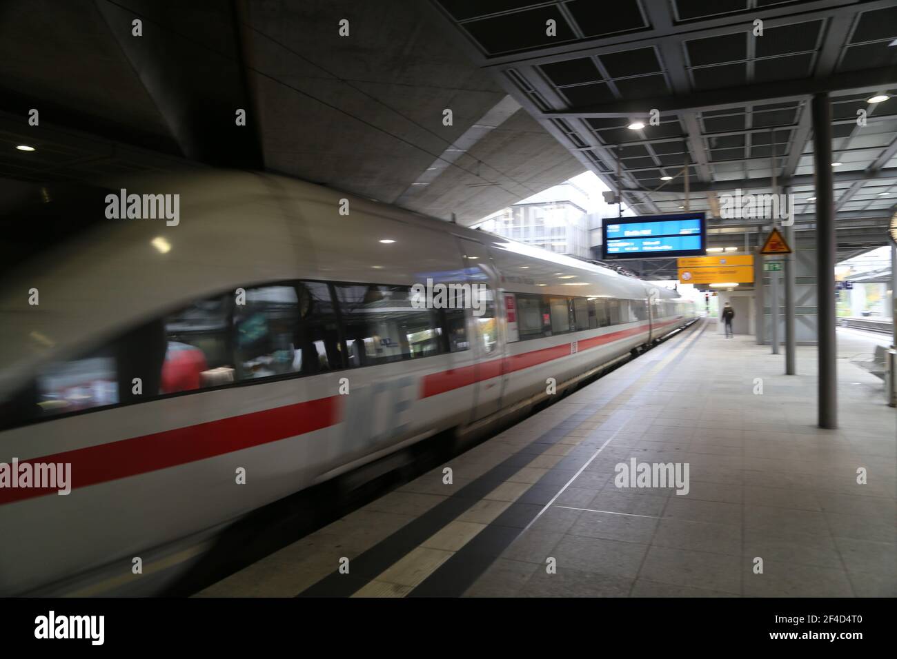 In coming train at train station Stock Photo - Alamy
