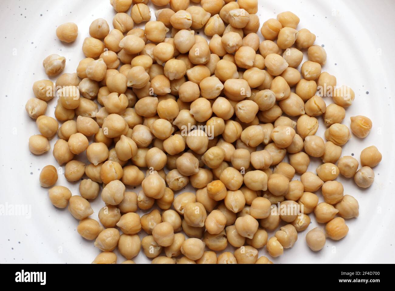 Raw chickpeas on rustic wooden hi-res stock photography and images - Alamy