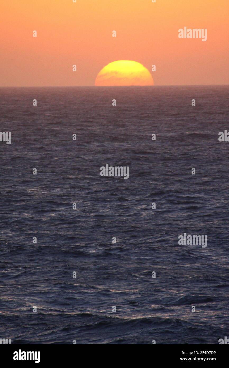 sunrise over ocean Stock Photo - Alamy