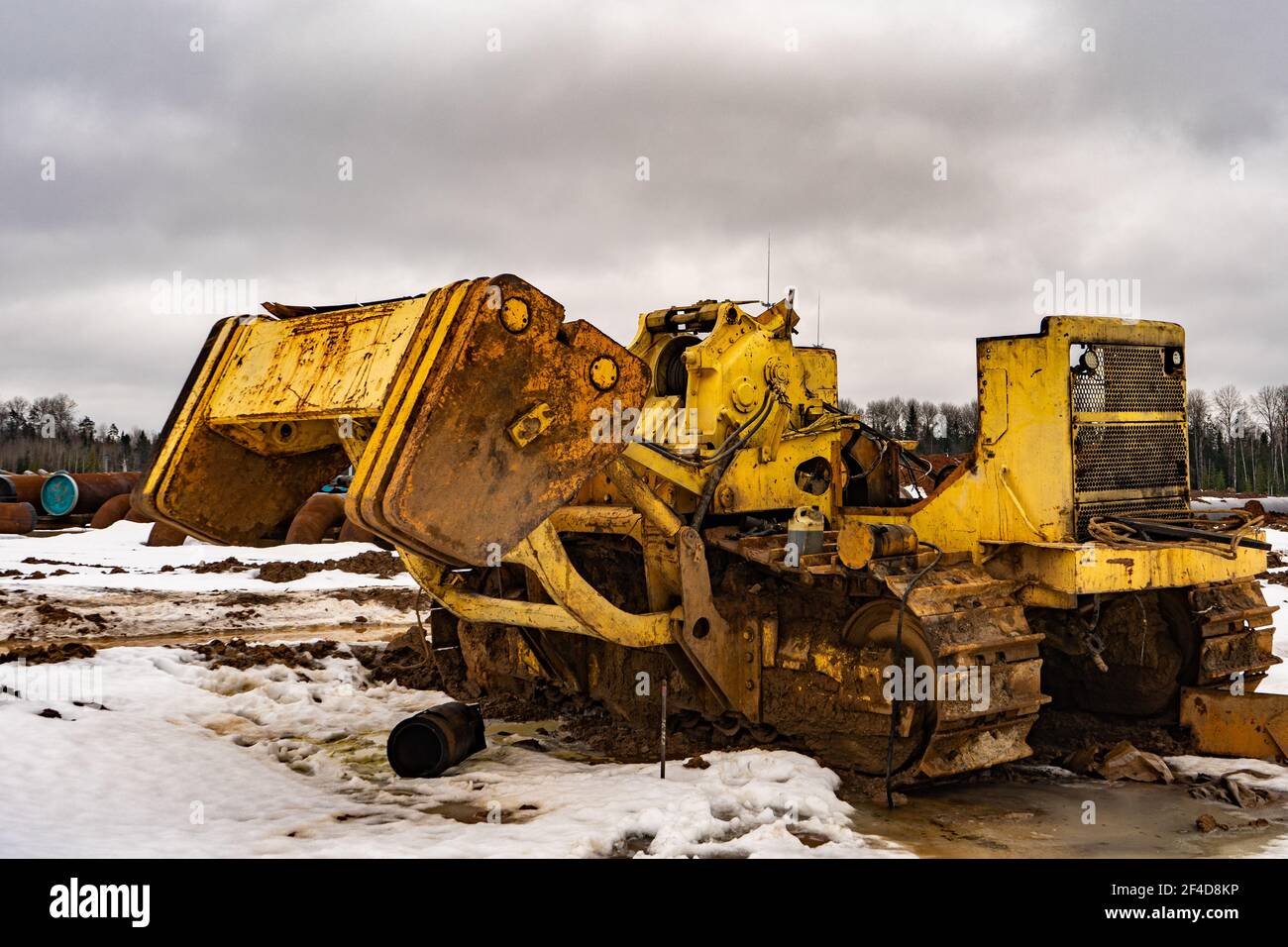 Large yellow tracked pipelayer. Abandoned broken out tractor for laying ...
