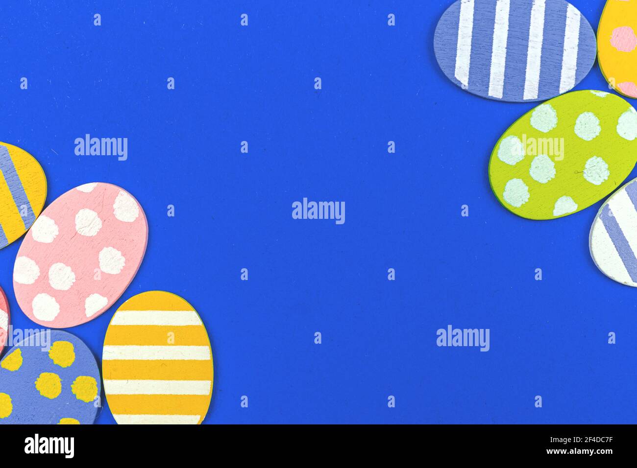 Easter border frame composition on a blue bakground, copy space photo ...