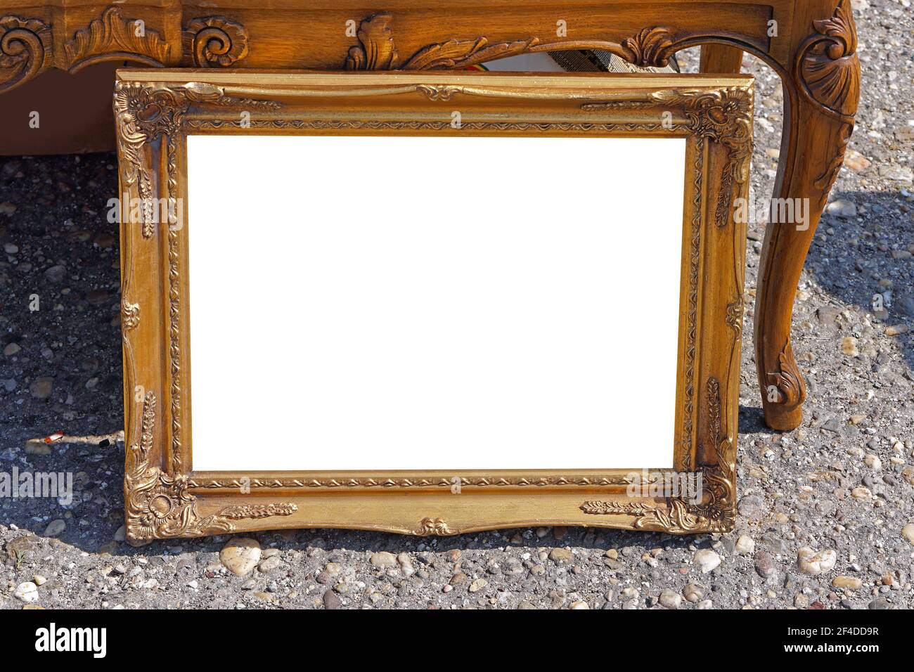 Empty space gold picture frame outside Stock Photo - Alamy