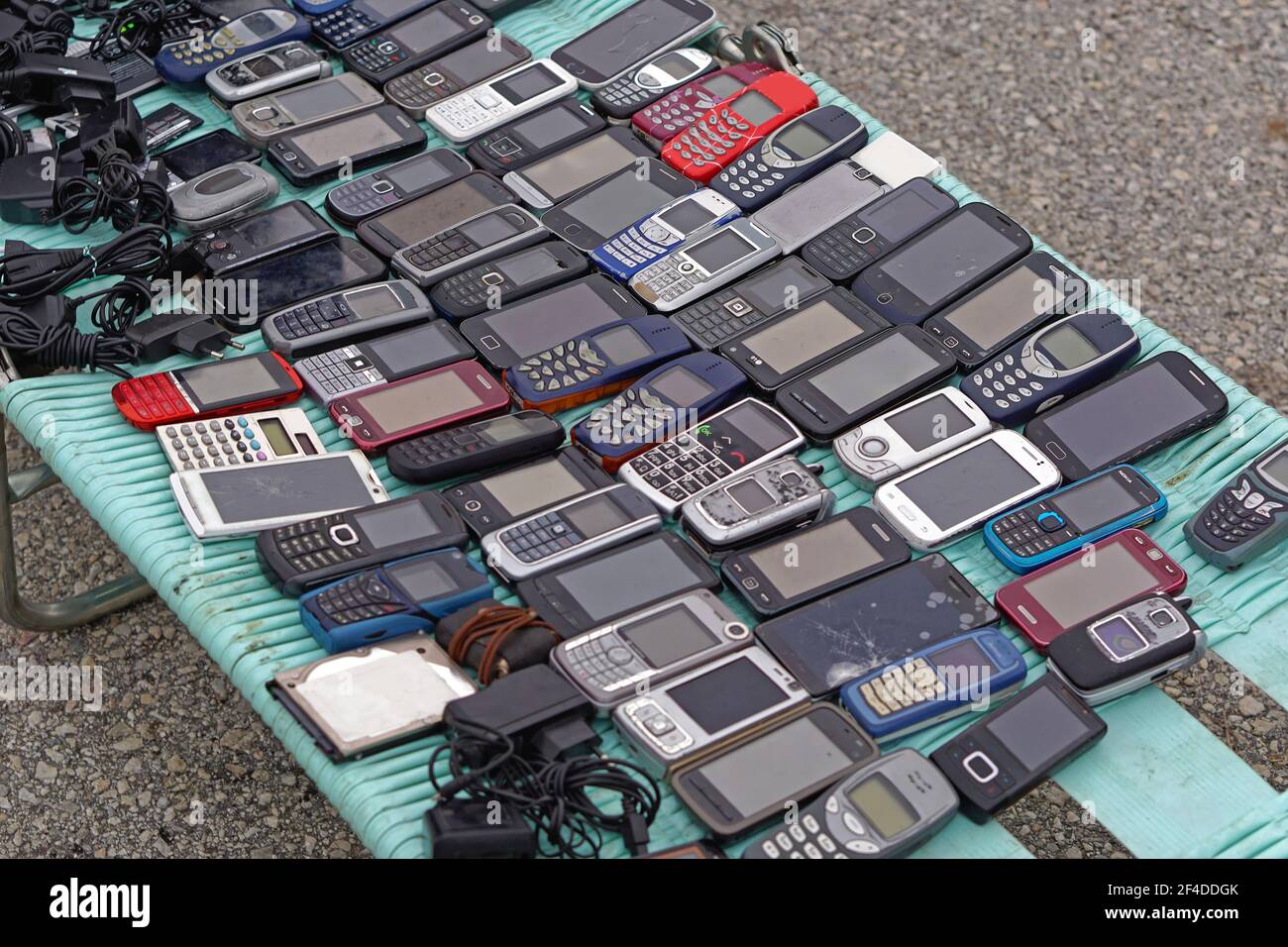 Big collection of old mobile phones at flea market Stock Photo - Alamy