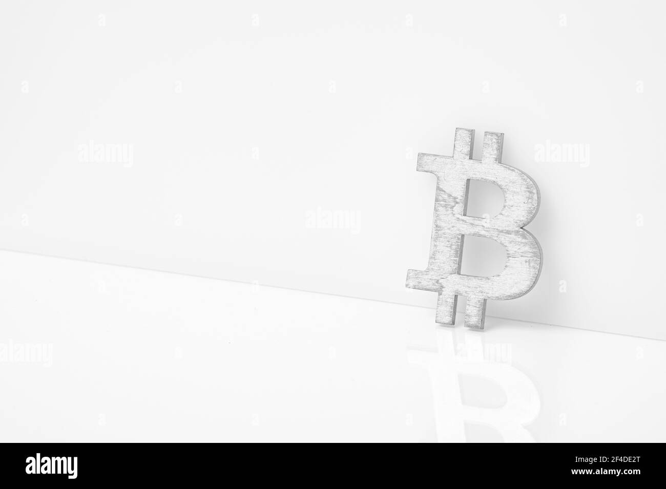 Bitcoin sign shape on white background Stock Photo - Alamy