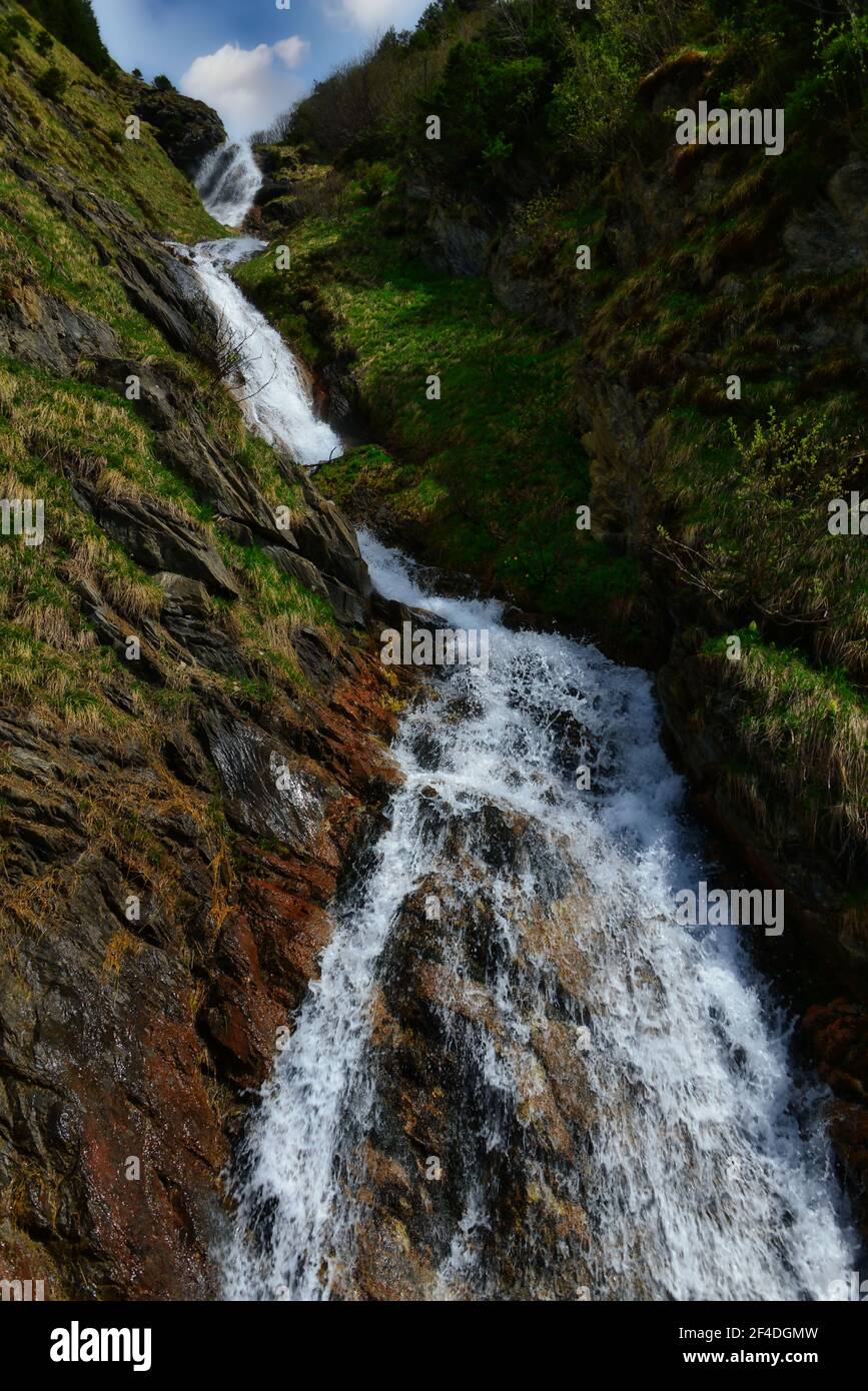 Close-Up of an alpine waterfall in mountains, Switzerland Stock Photo ...