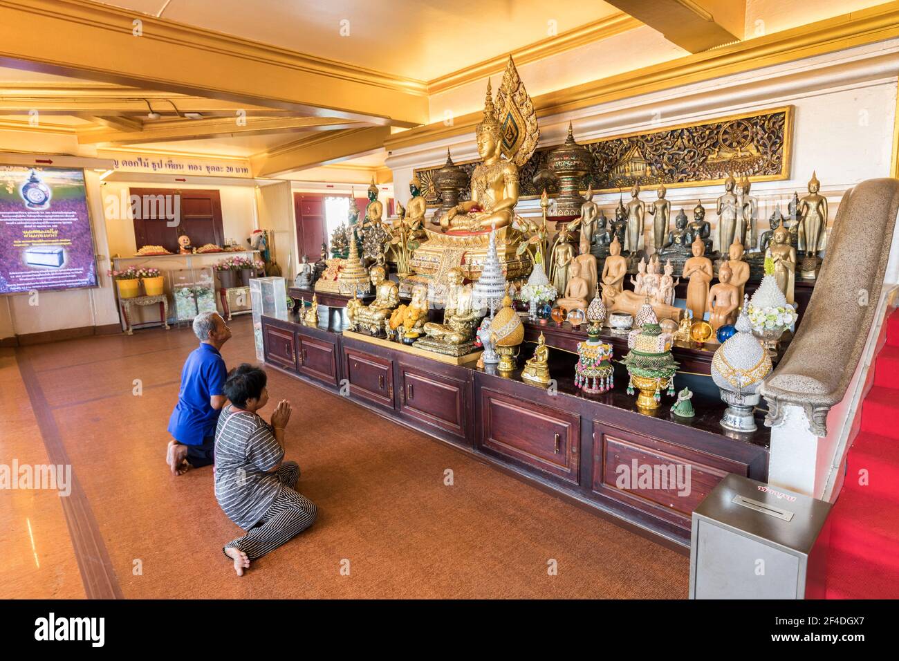 Praying people in temple hi-res stock photography and images - Alamy