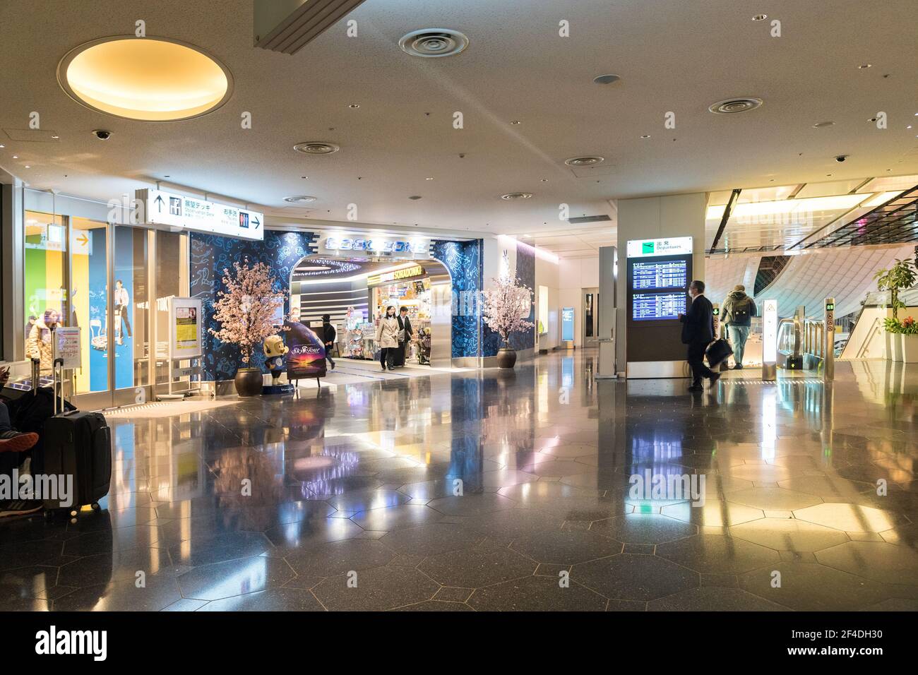 Reflections on floor of shopping concourse at Tokyo International ...