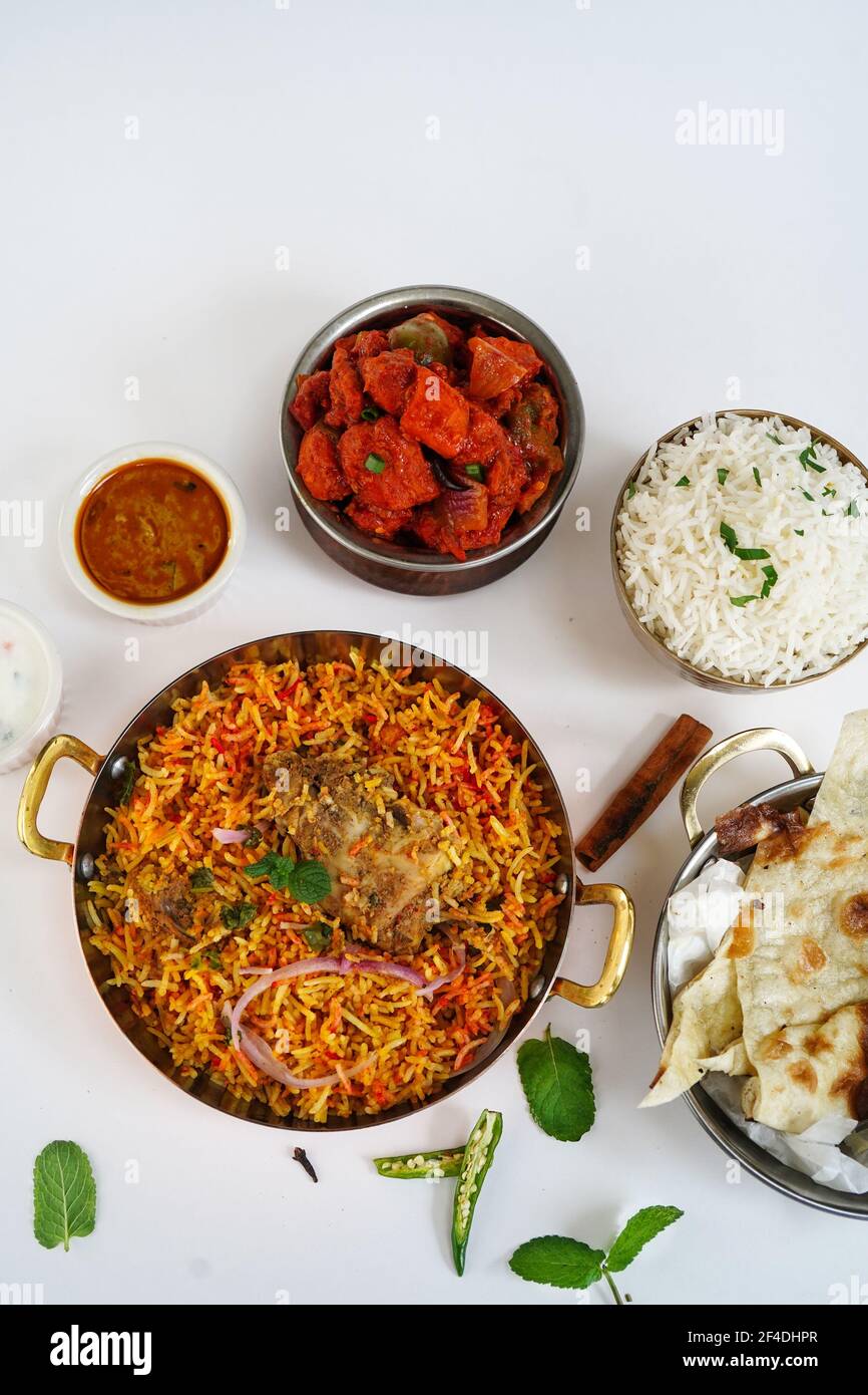 Indian Non veg meal Chicken biryani Roti Chilli chicken rice salan and ...