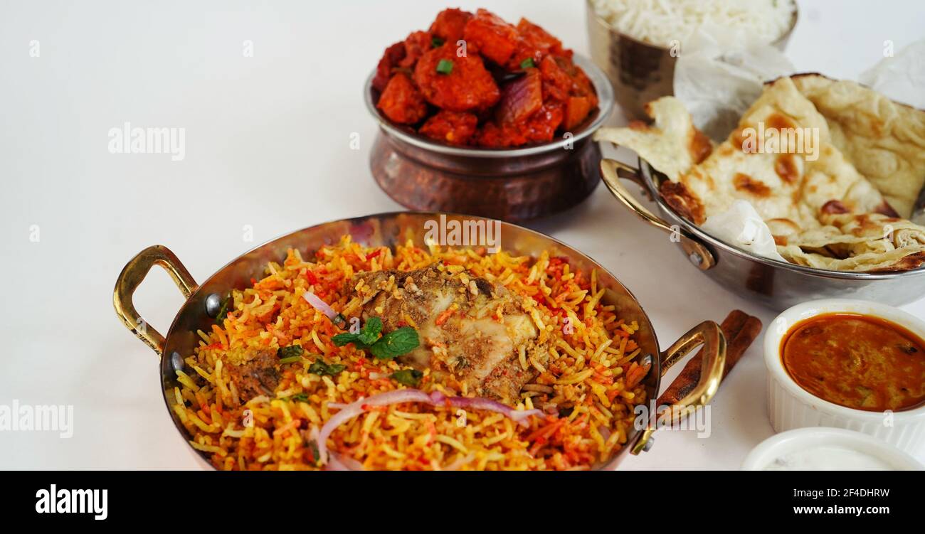 Indian Non veg meal Chicken biryani Roti Chilli chicken rice salan and ...