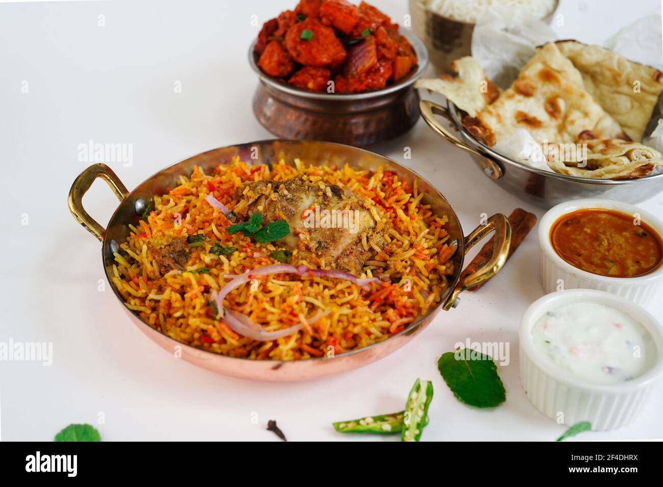 Indian Non veg meal Chicken biryani Roti Chilli chicken rice salan and ...