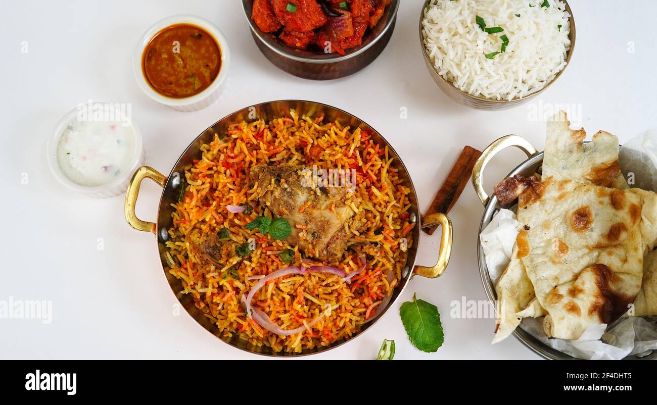 Indian Non veg meal Chicken biryani Roti Chilli chicken rice salan and ...