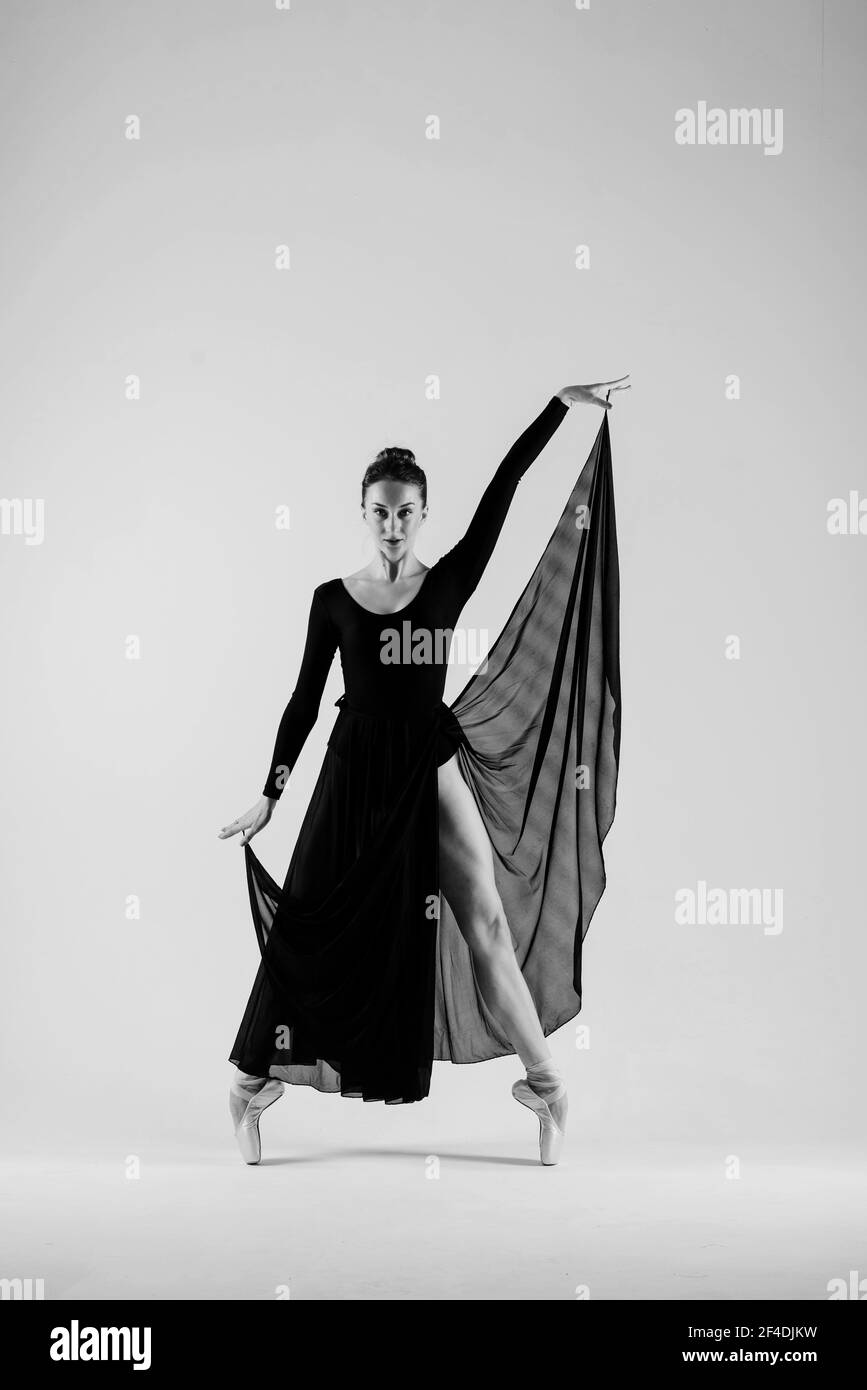 Modern style ballet dancer posing on a studio background Stock Photo ...