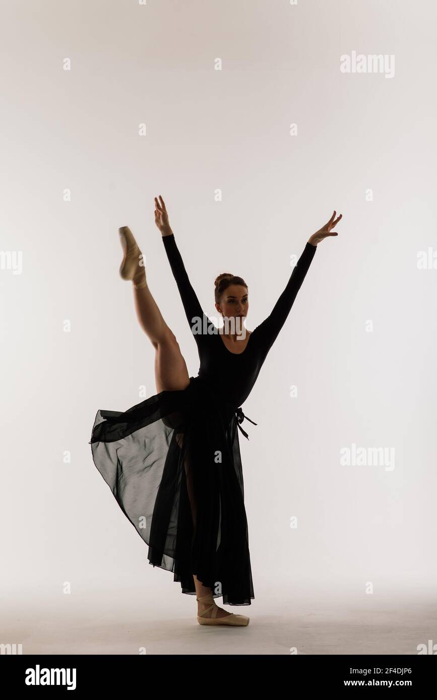 Modern style ballet dancer posing on a studio background Stock Photo ...