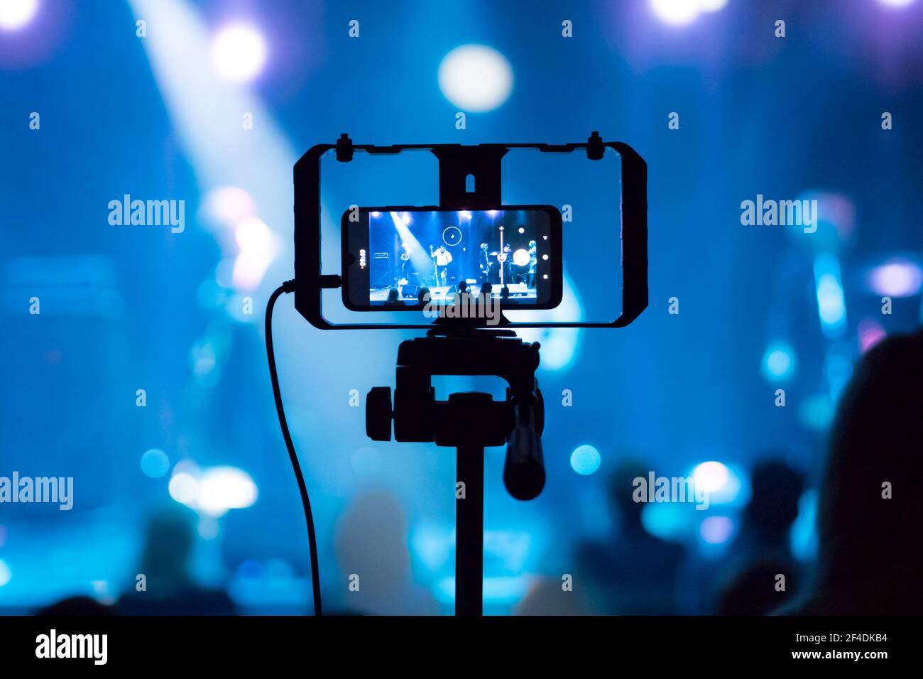 a rock concert recorded with a mobile phone Stock Photo - Alamy