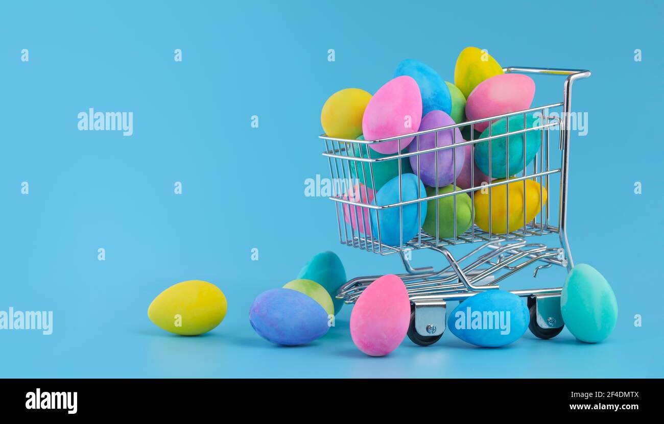 Colorful Easter eggs piled in shopping cart for Easter shopping Stock ...