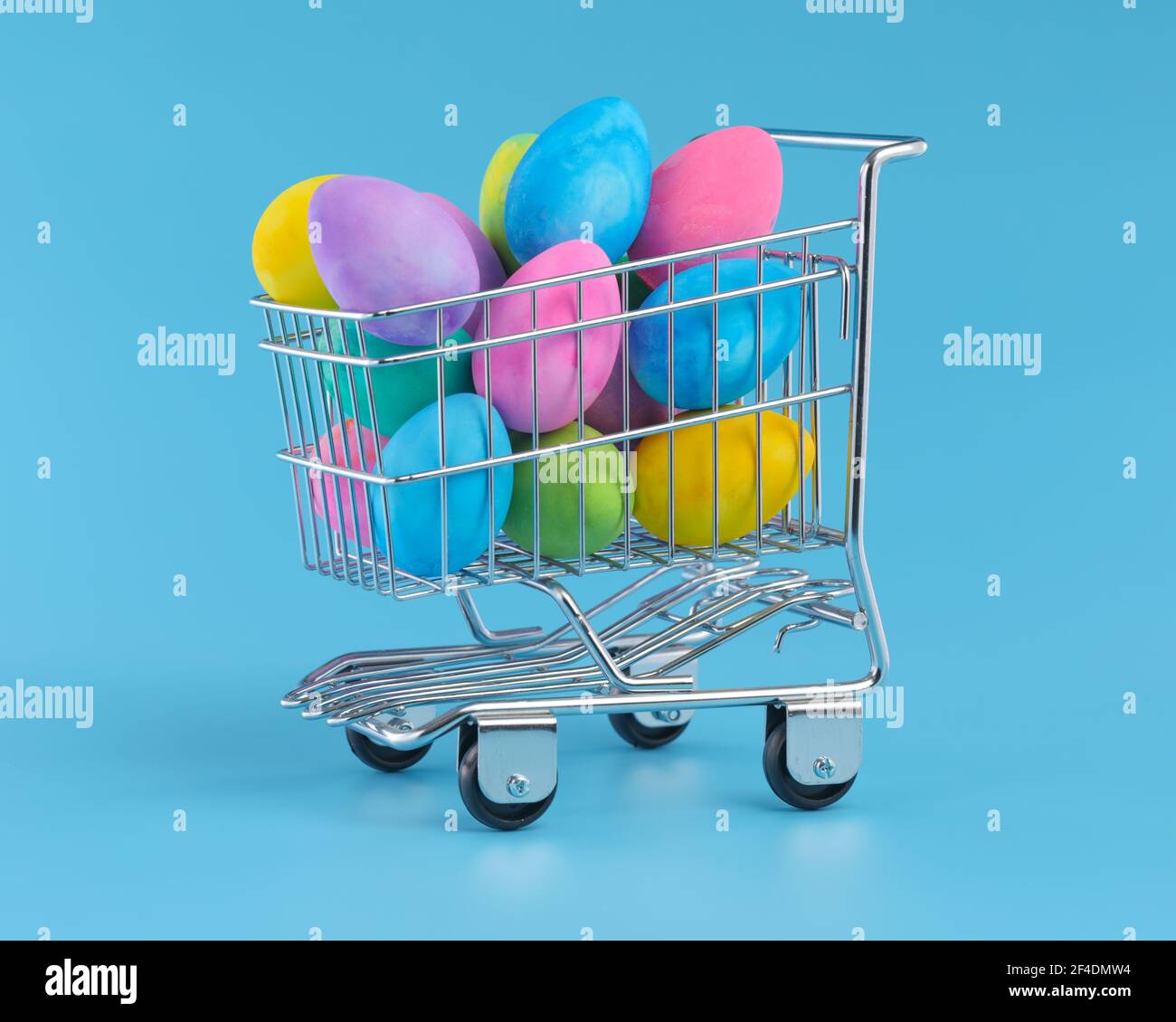 Colorful Easter eggs piled in shopping cart for Easter shopping Stock ...