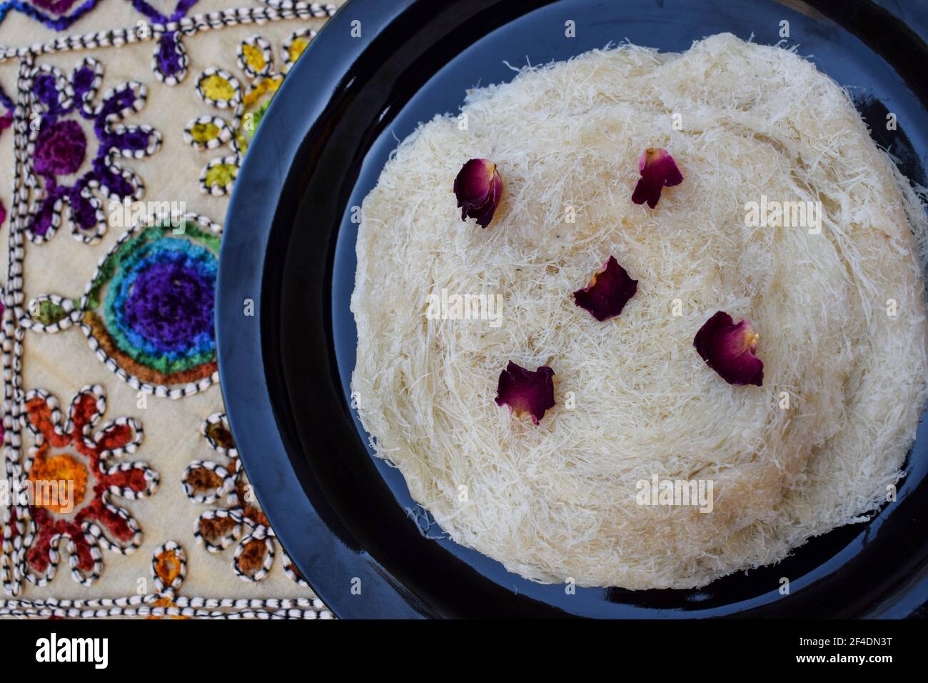 Indian traditional sweet dish Sutarfeni is shredded, flaky, rice-flour ...