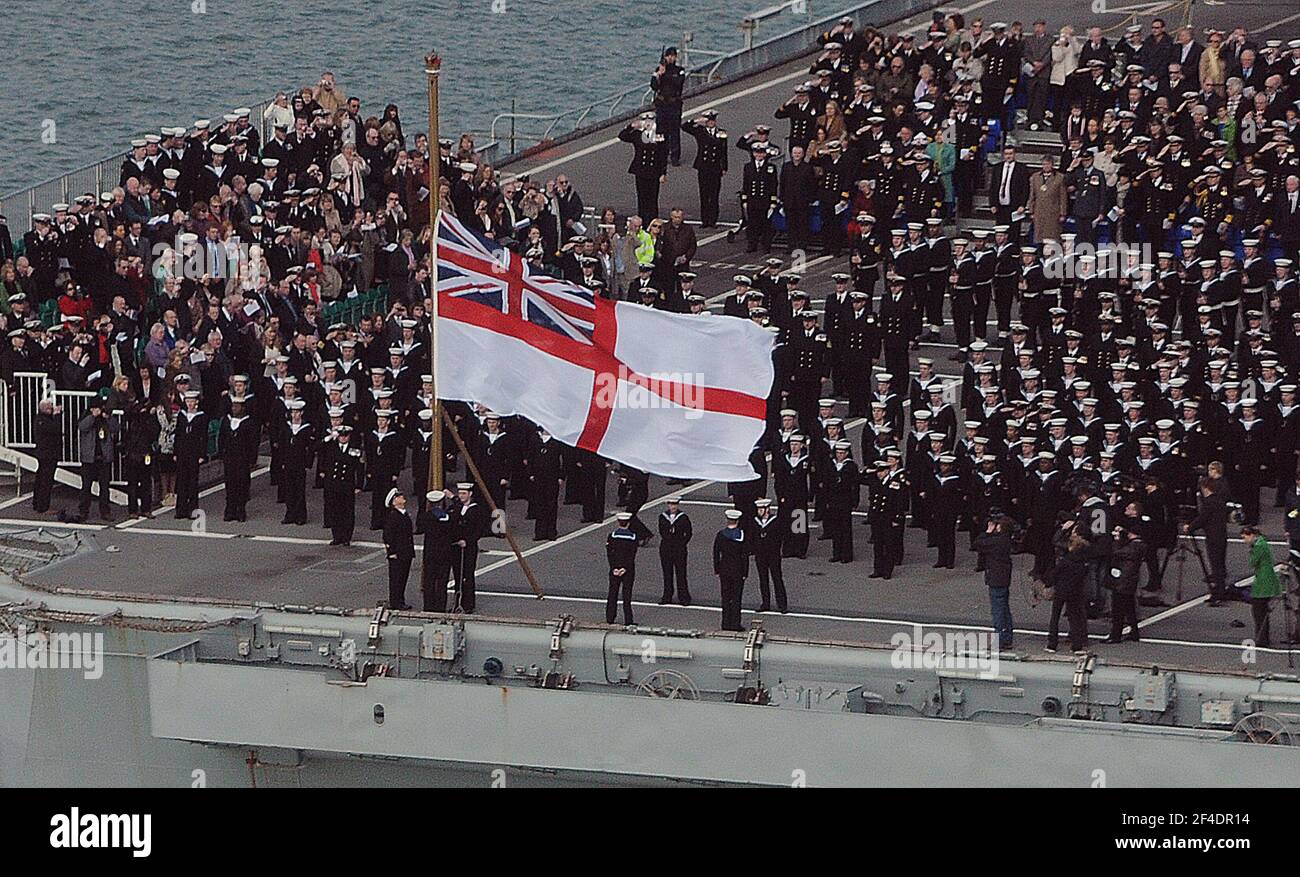 HMS ARK ROYAL DECOMMISSIONED THE WHITE ENSIGN IS LOWERED WATCHED BY ...
