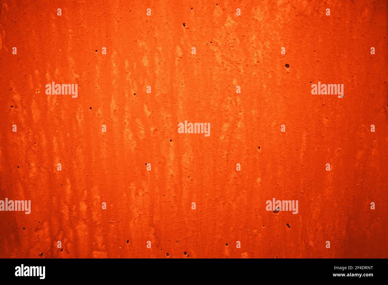 An abstract blurred pattern in light and dark orange colors for ...