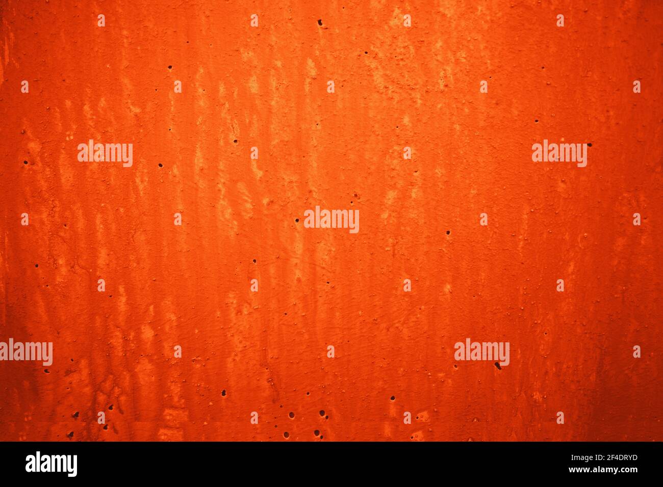 An abstract blurred pattern in light and dark orange colors for ...
