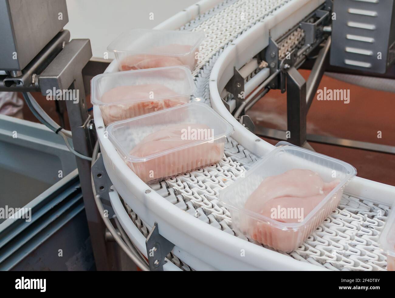 Production line with packaging and cutting of meat.Food products meat ...