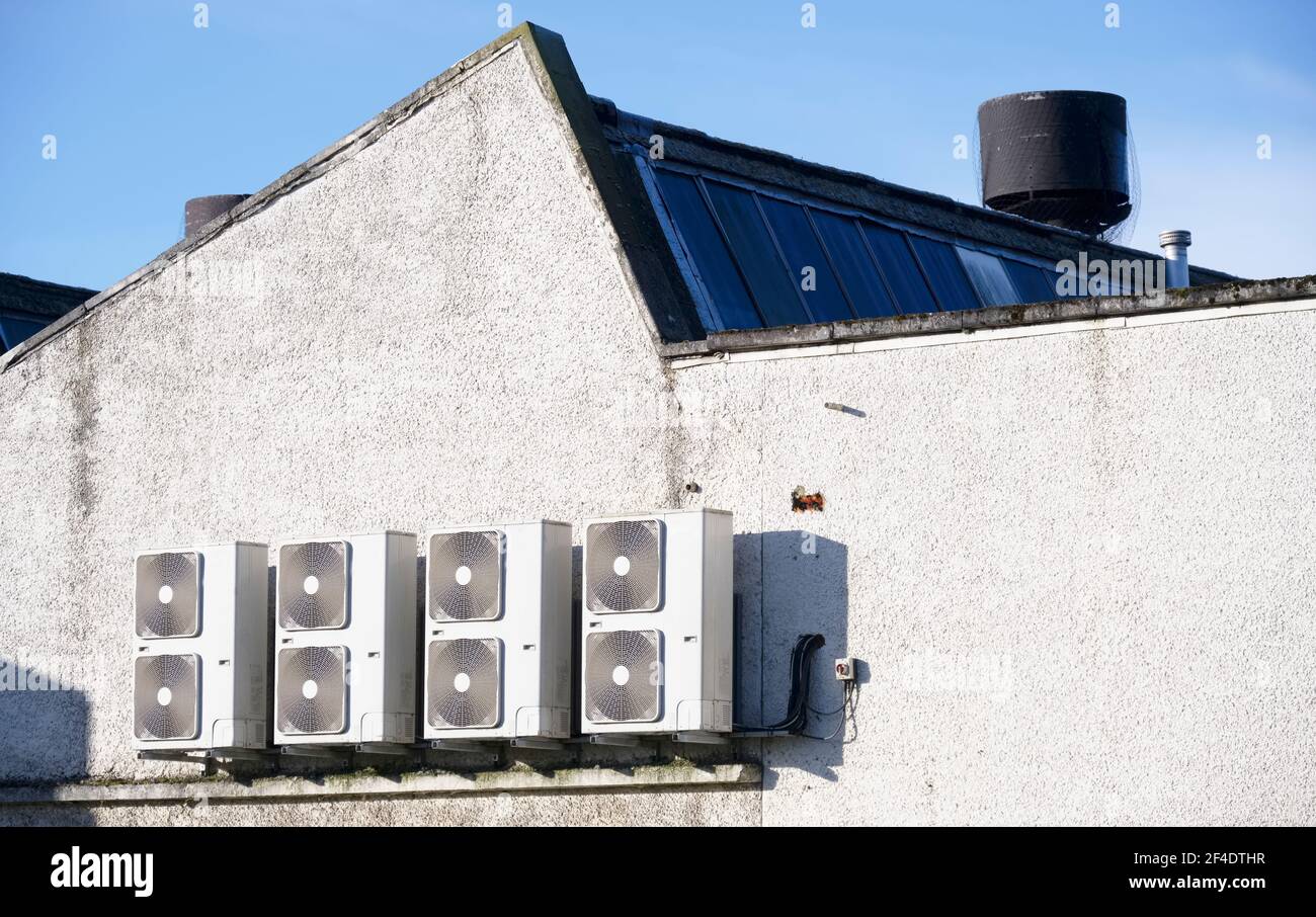 Condenser units for air conditioning system wall mounted outdoors Stock ...