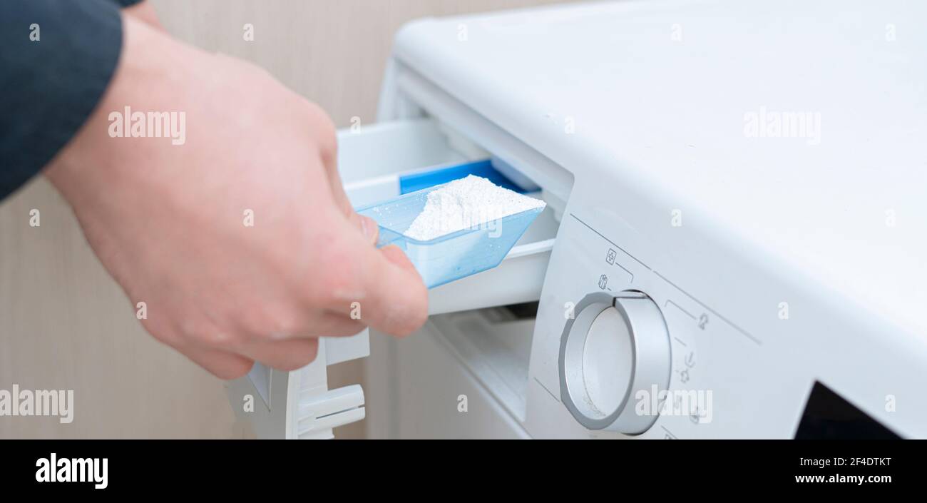 Woman powder washing machine hi-res stock photography and images - Alamy