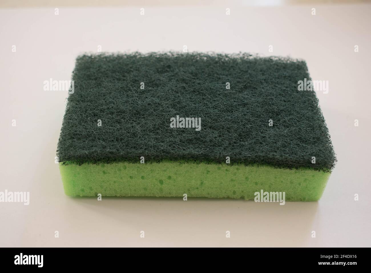 Polyurethane cleaning green sponge isolated on white background.Sponge ...