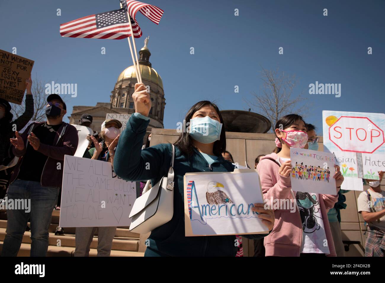 Atlanta, GA, USA. 20th Mar, 2021. A first generation immigrant from ...