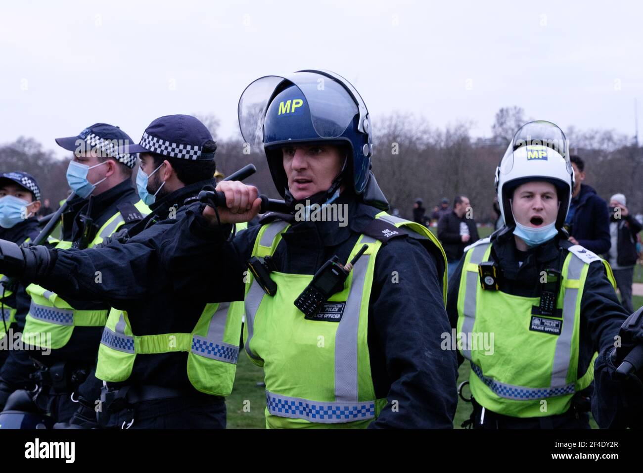 London, UK. March 20, 2021. TSG police with shields and helmets. Stand ...
