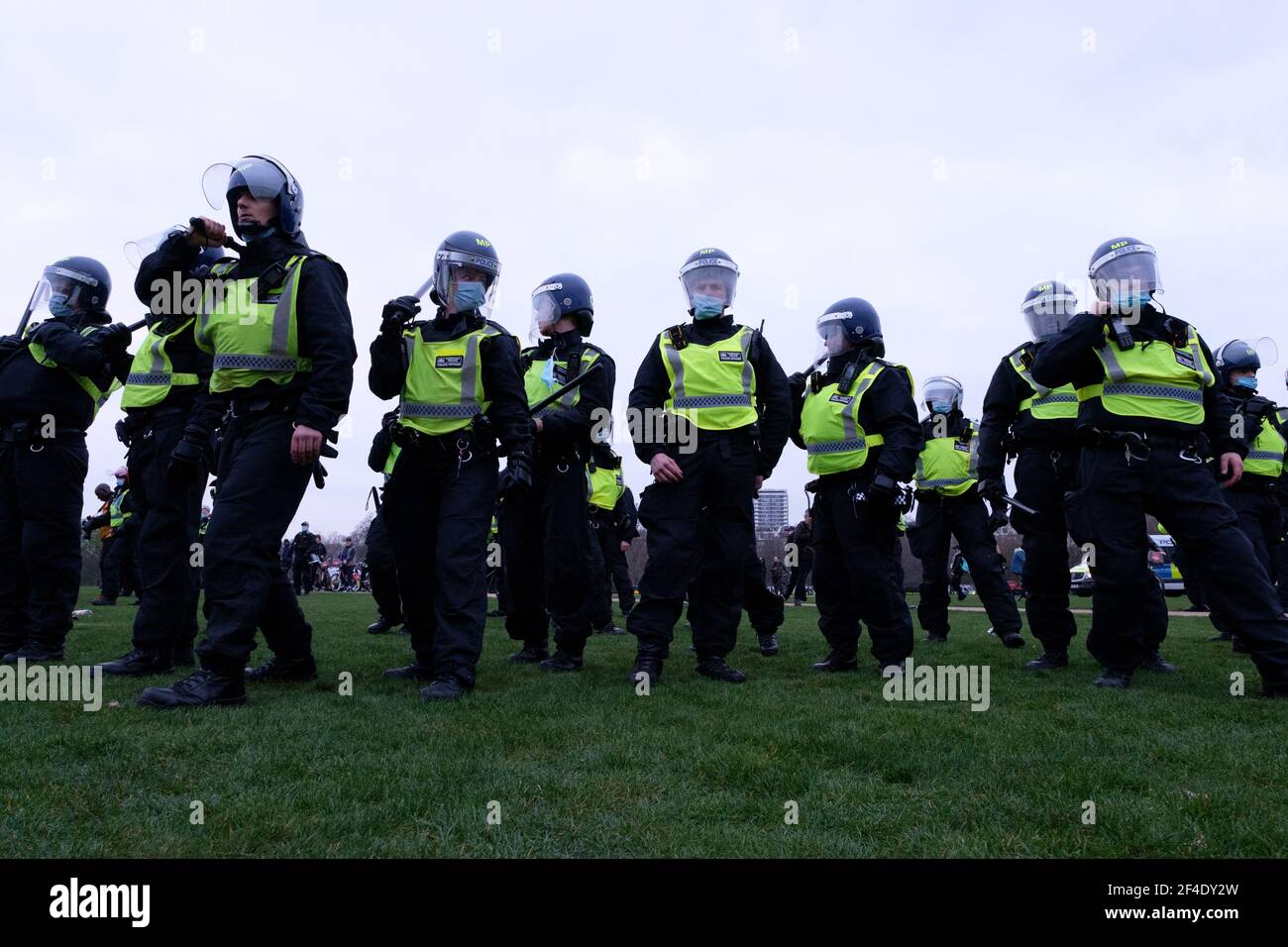 London, UK. March 20, 2021. TSG police with shields and helmets. Stand ...