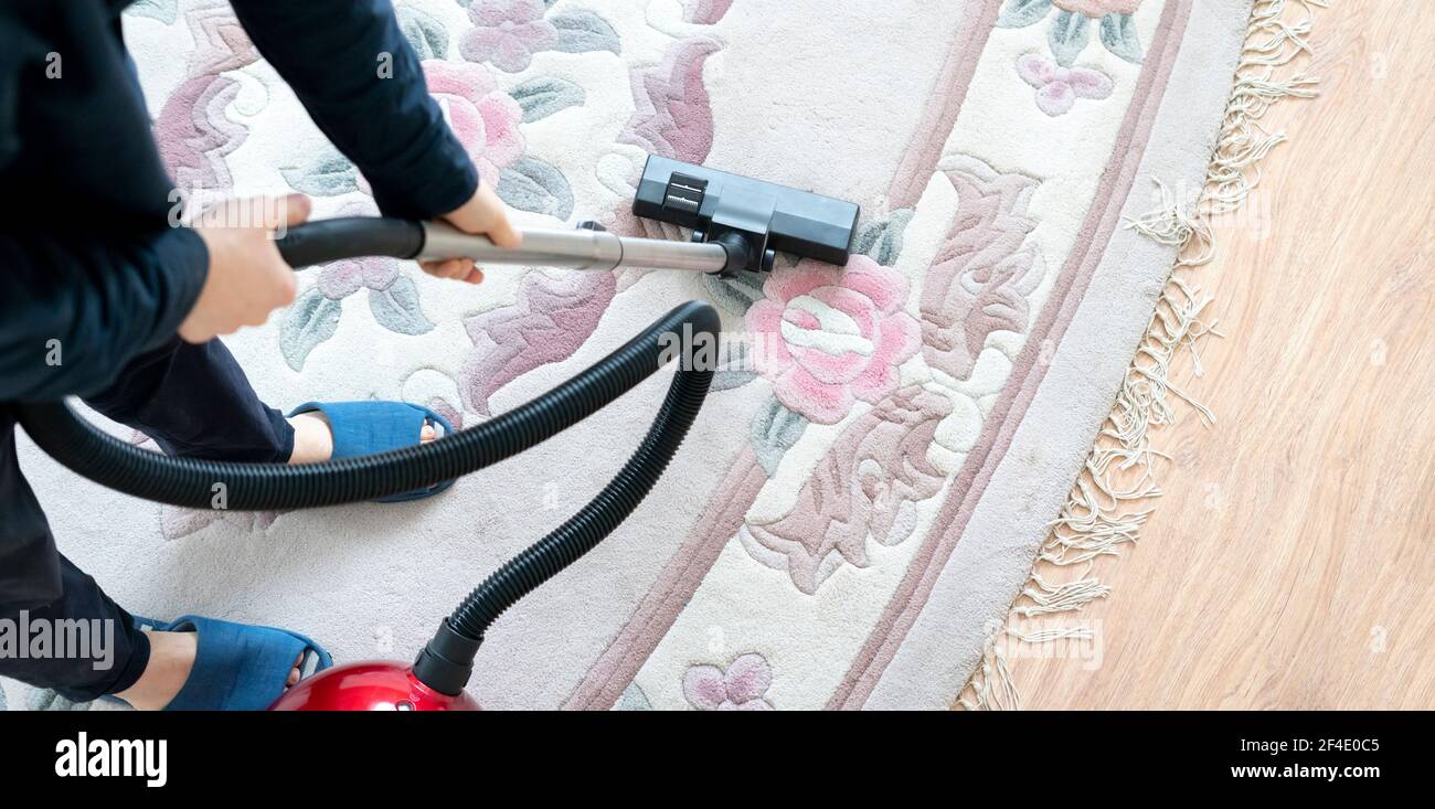 Man home using vacuum cleaner hi-res stock photography and images - Alamy
