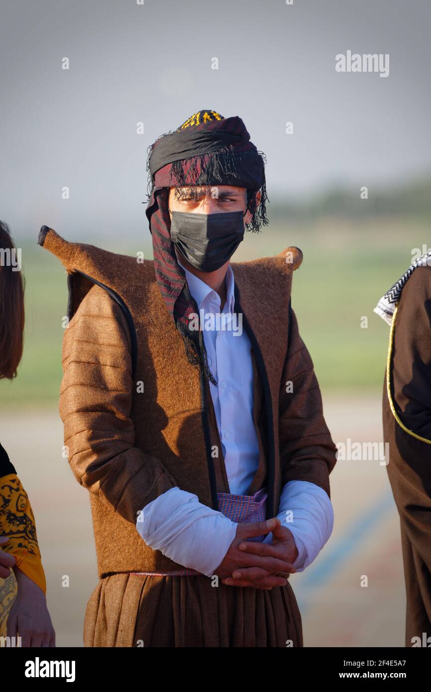 Erbil, Iraq. Hawraman man wears the traditional leather jacket at Erbil ...