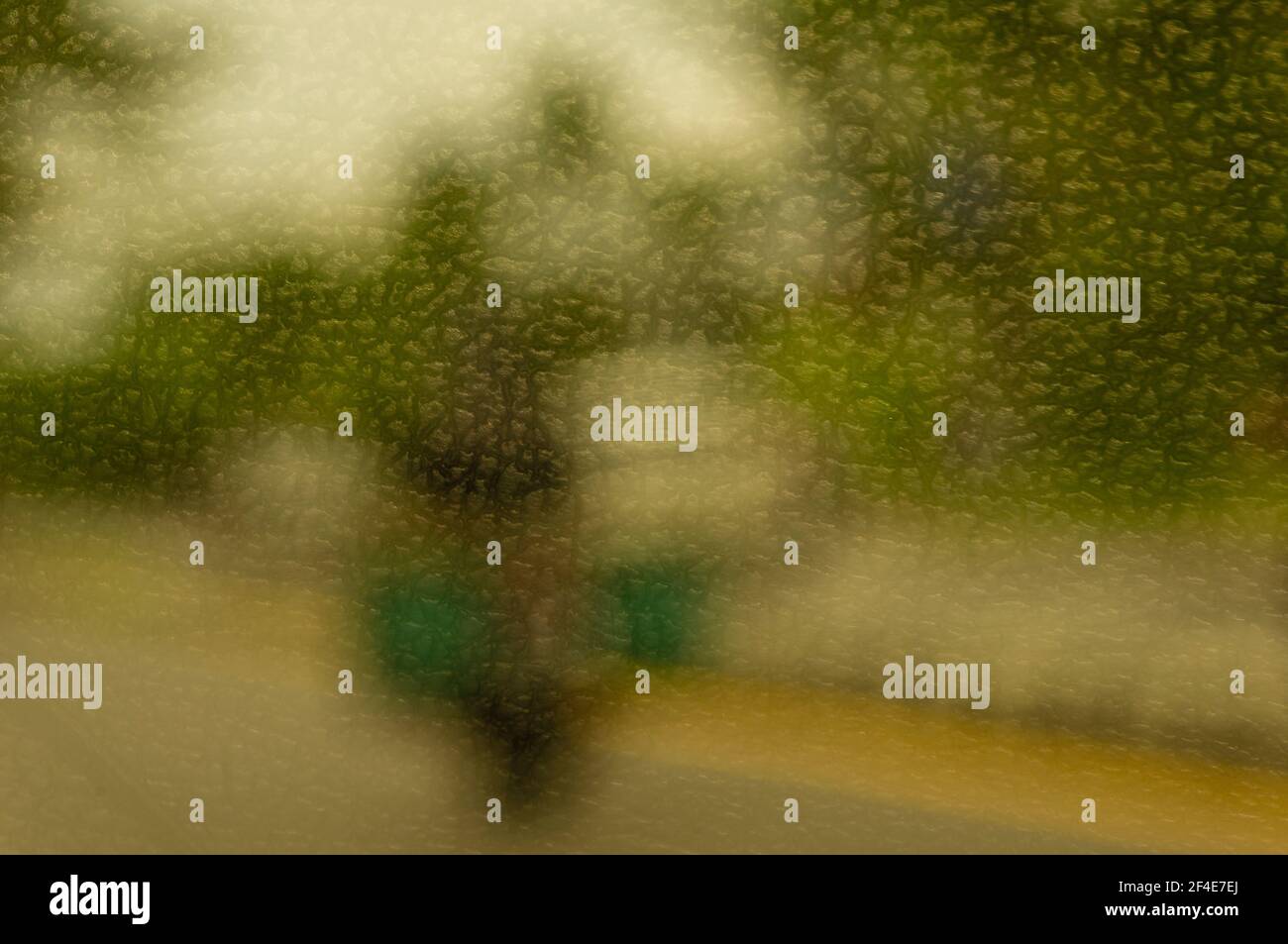 Defocused abstract background of a view behind a glass surface with ...