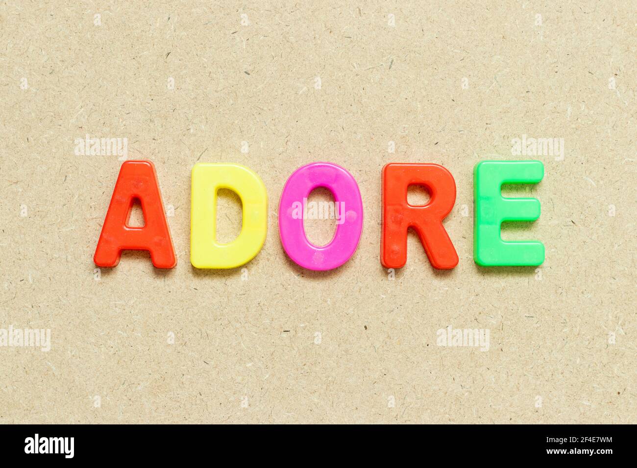 Color alphabet letter with word adore on wood background Stock Photo ...